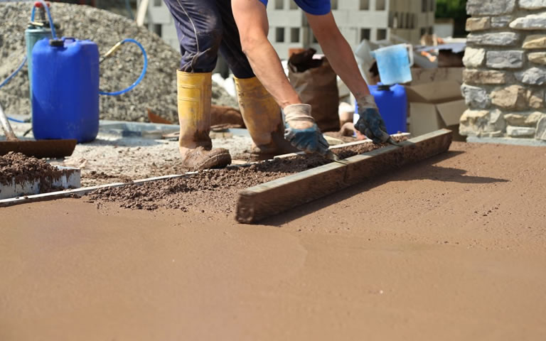 Sistema integrado para la realización de pavimentos de hormigón lavado